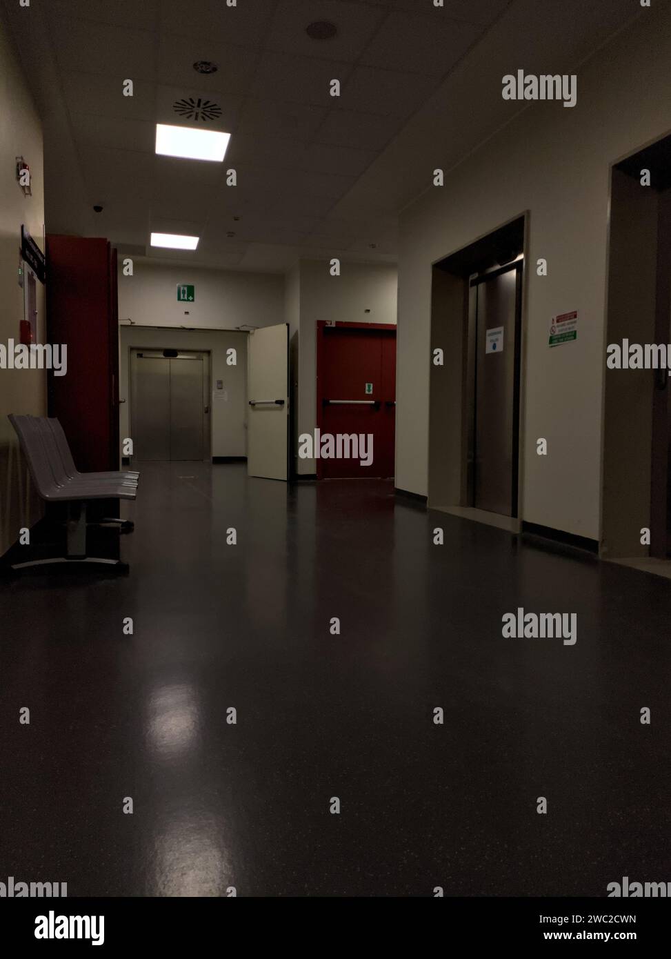 Corridor of a hospital with escape doors in it Stock Photo - Alamy