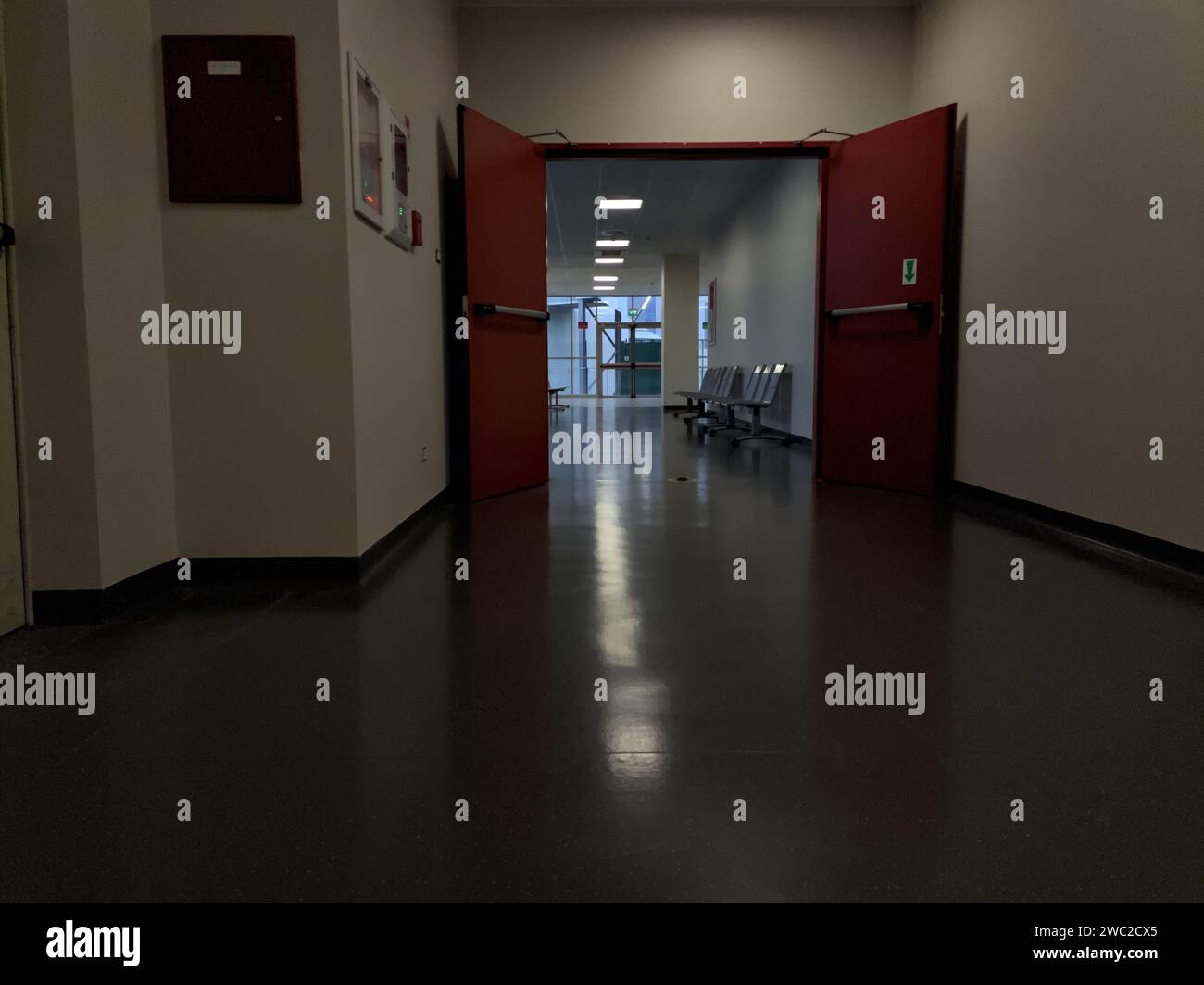 Corridor of a hospital with escape doors in it Stock Photo - Alamy