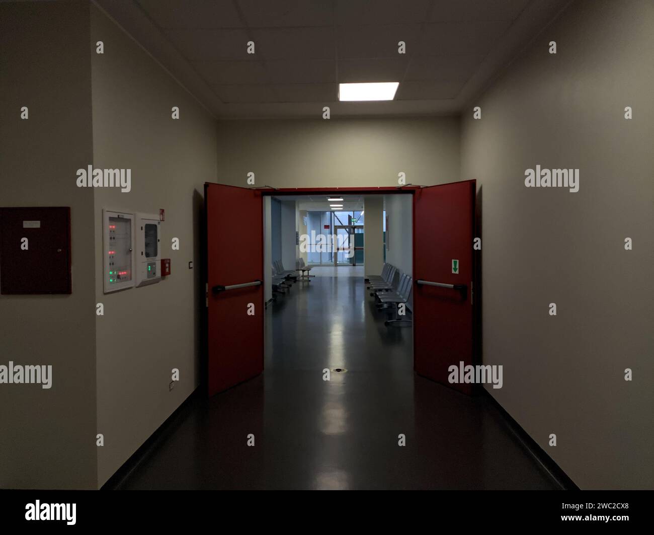 Corridor of a hospital with escape doors in it Stock Photo - Alamy