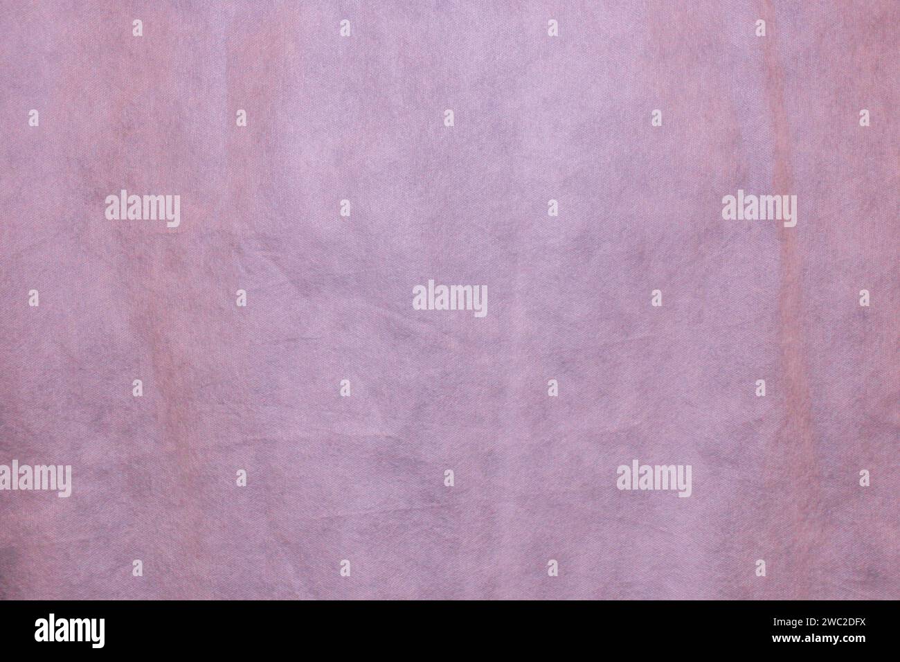 The texture is pale red in non-woven fabric. Background for design with ...