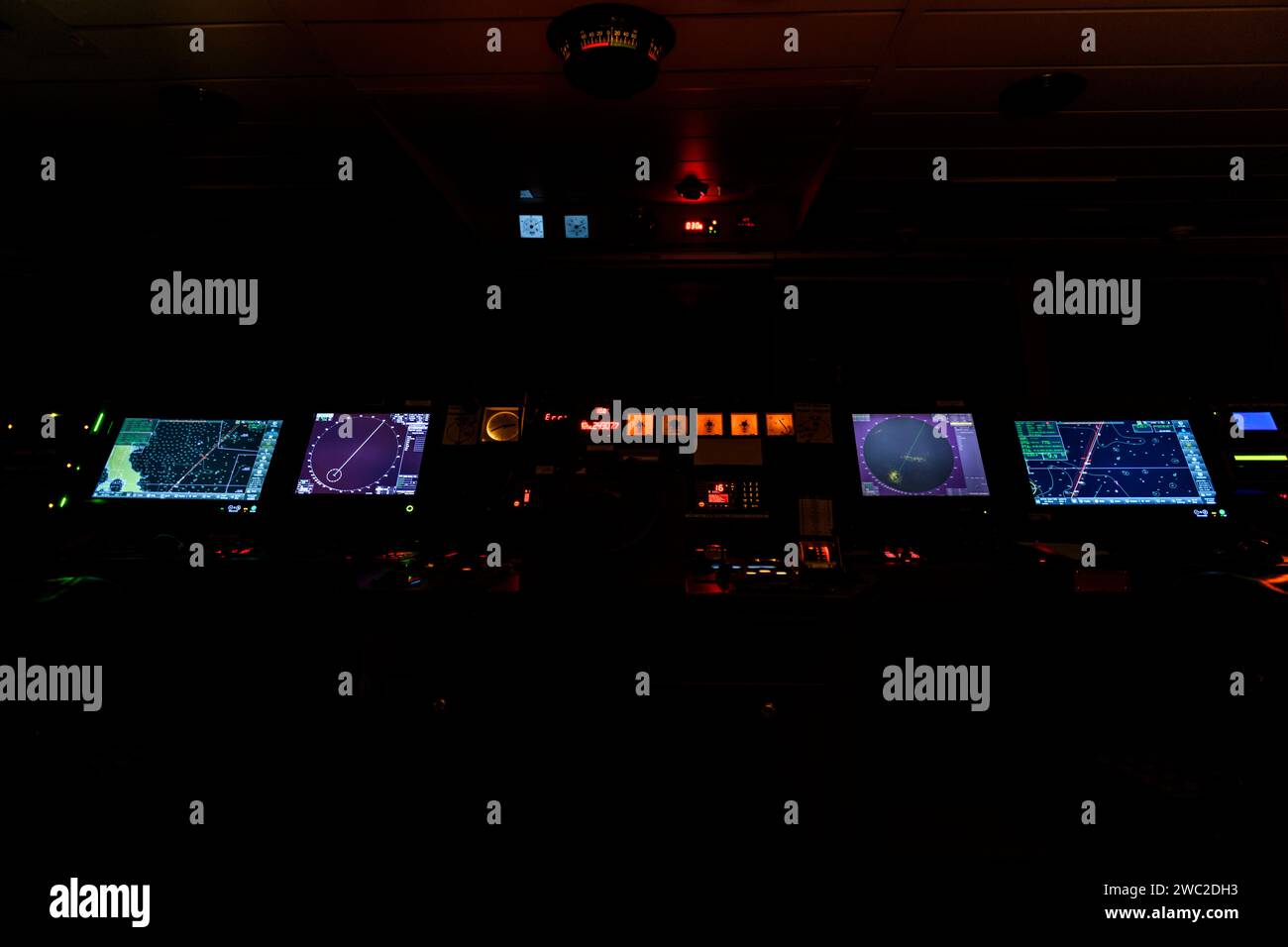 Navigational bridge on big cargo ship. Wheelhouse on vessel. ECDIS ...