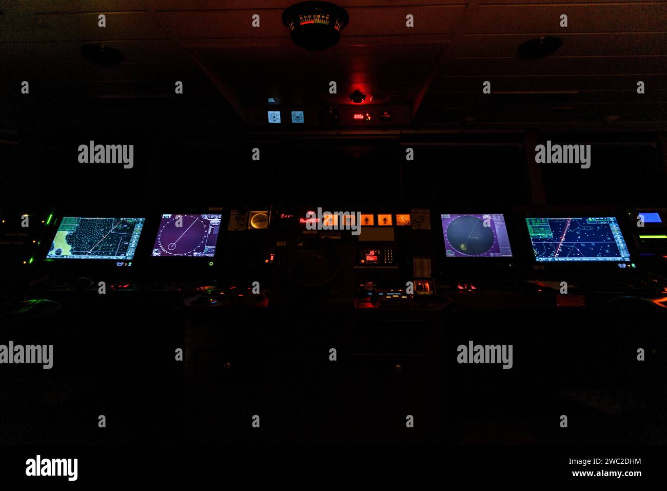 Navigational bridge on big cargo ship. Wheelhouse on vessel. ECDIS ...