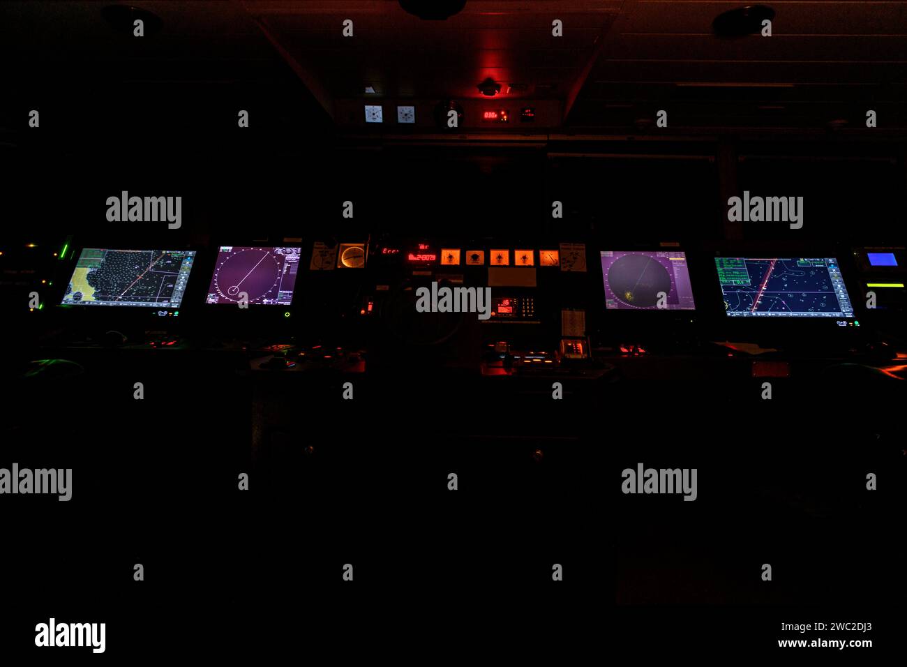 Navigational bridge on big cargo ship. Wheelhouse on vessel. ECDIS ...