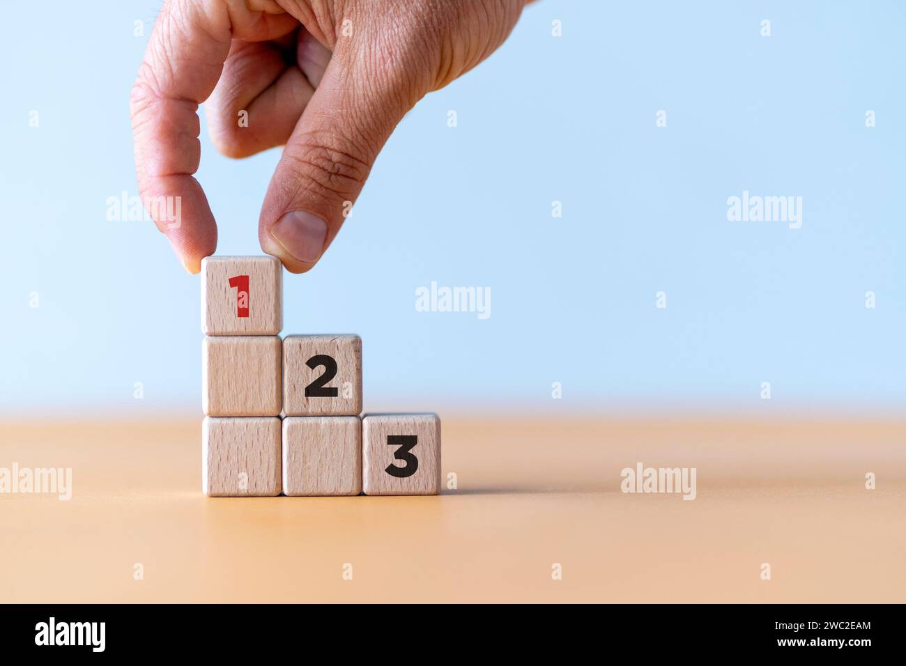 Wooden Cube blocks with number first, second and third with copy space ... Wooden Cube blocks with number first, second and third with copy space ...