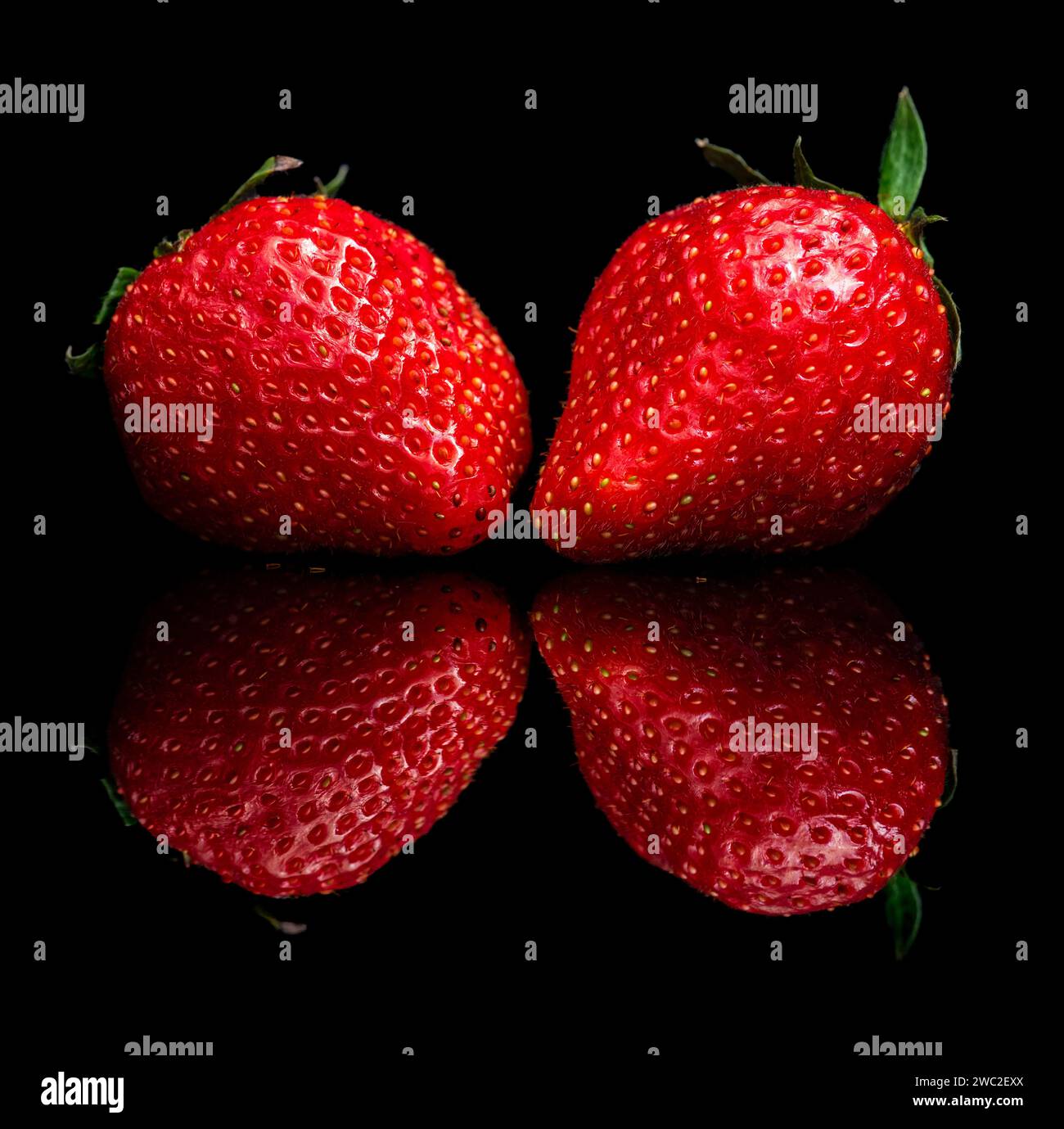 Succulent red strawberries hi-res stock photography and images - Alamy