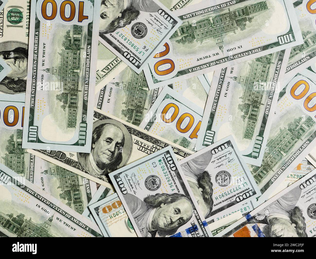 Flat texture and background of real 100 bills, numbers are different ...