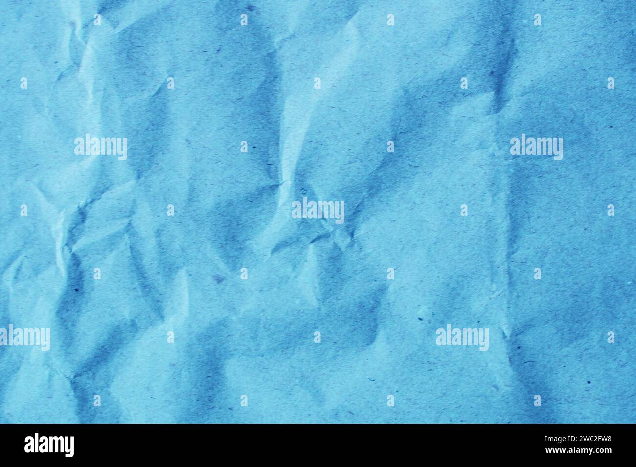 The texture of a sheet of crumpled blue paper Stock Photo - Alamy