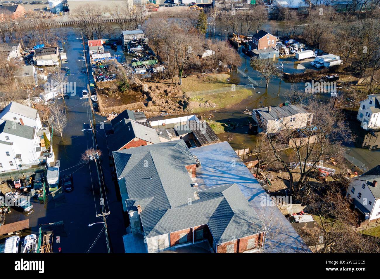 Water overflows from the Passaic River after heavy rain floods a ...