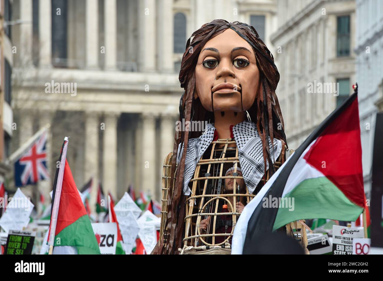 London, England, UK. 13th Jan, 2024. Little Amal, the 3.5-meter puppet ...