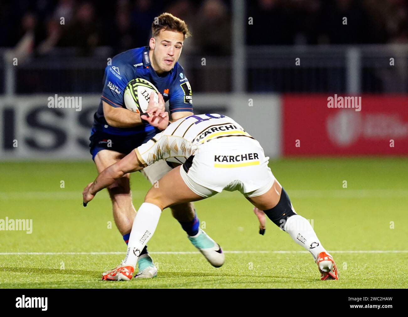 Edinburgh's Wes Goosen (left) and Gloucester's Adam Hastings in action ...