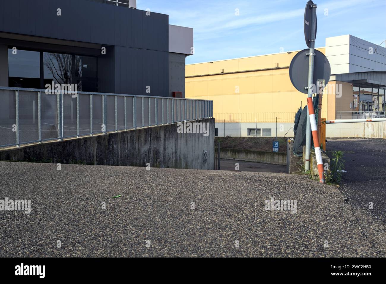 Descending alley in the back of a building Stock Photo - Alamy