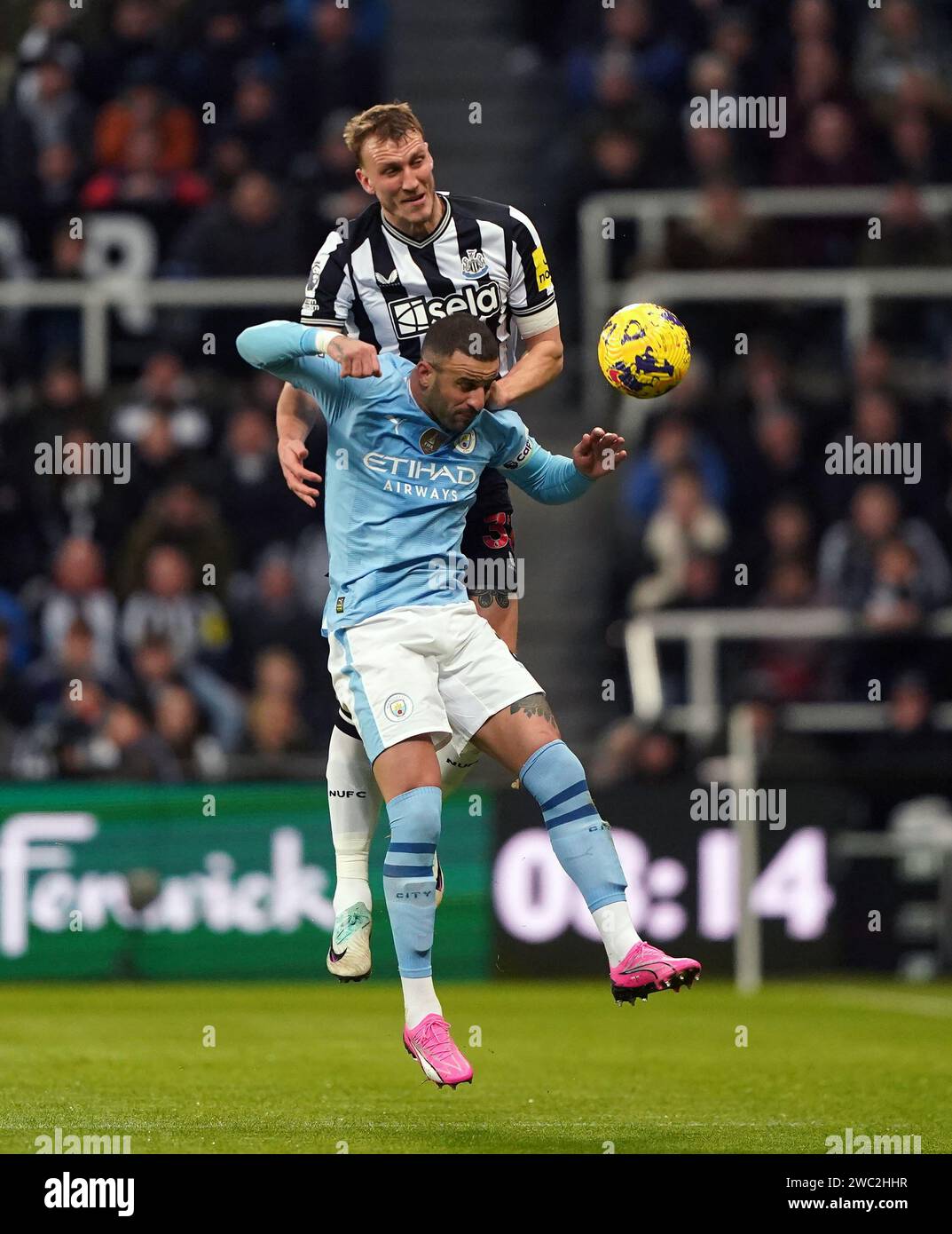 Newcastle United's Dan Burn and Manchester City's Kyle Walker battle ...