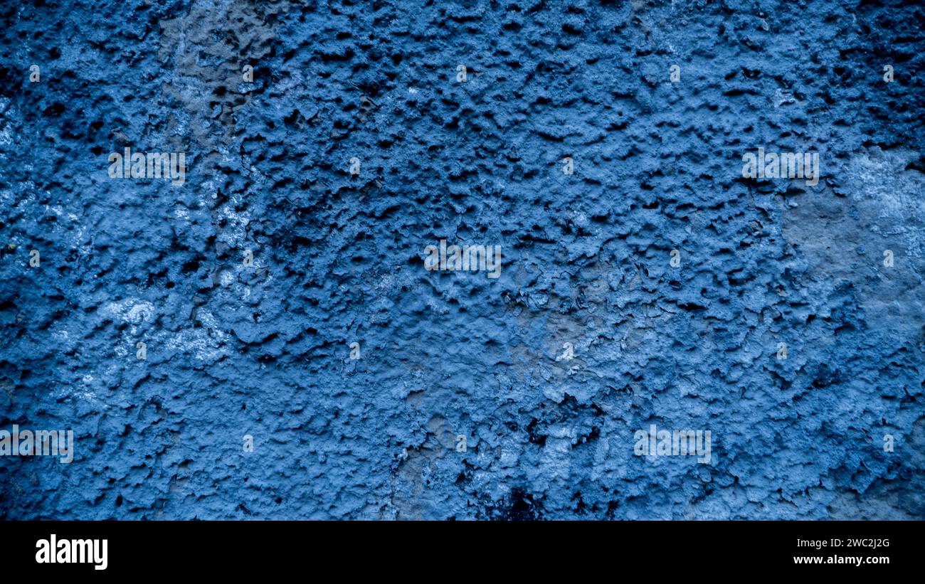 Blue abstract background..Beautiful blue textured plaster on the wall ...