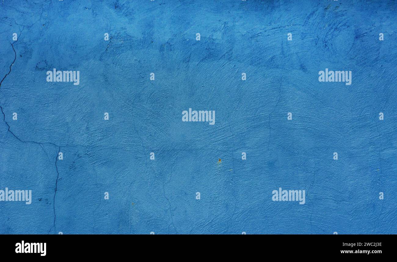 Abstract blue texture background. Surface of old damaged blue plaster ...