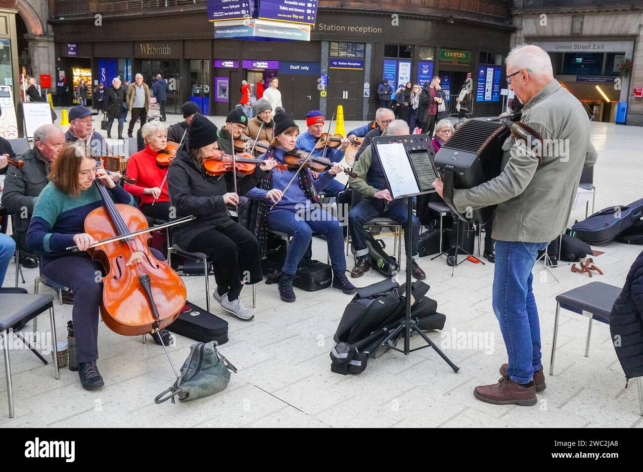 Glasgow, UK. 13th Jan, 2024. Pupils and tutors of Glasgow Fiddle Workshop, known as "GFW", a ...
