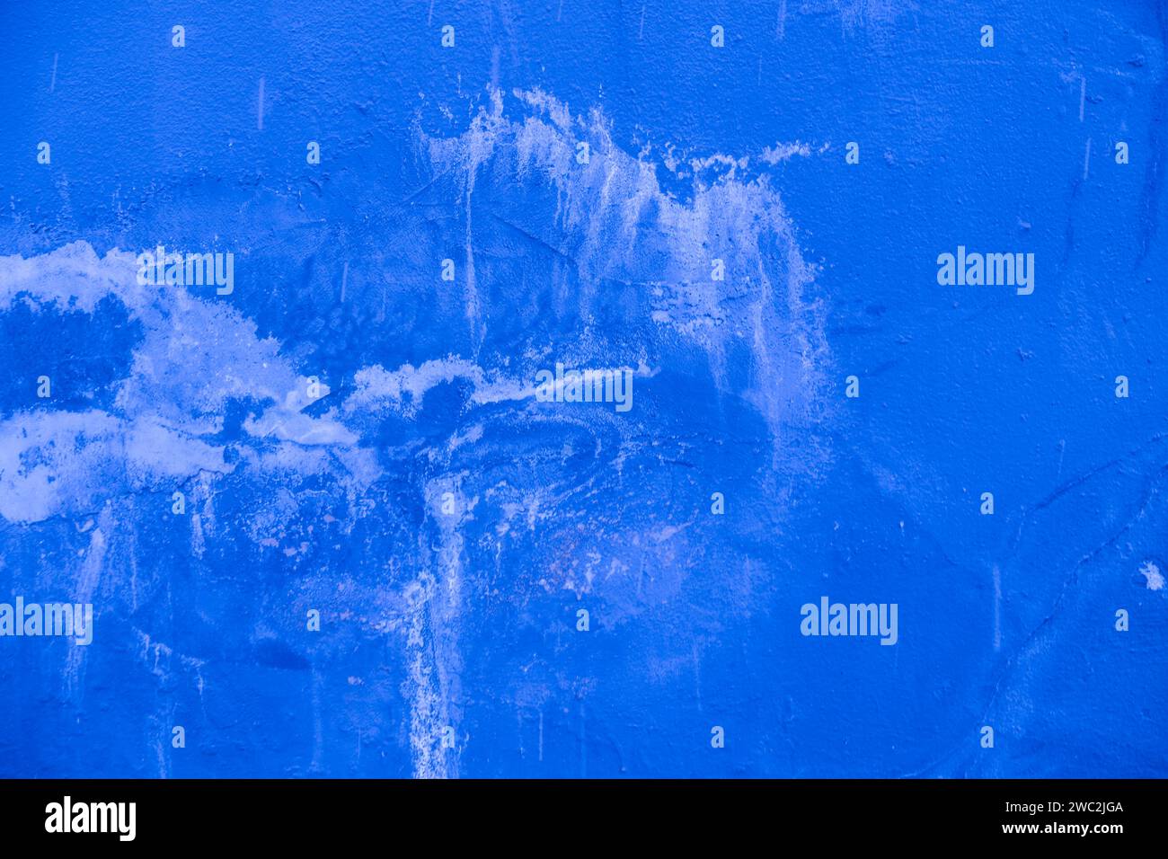 Textured blue plaster background with scratches and stains Stock Photo ...