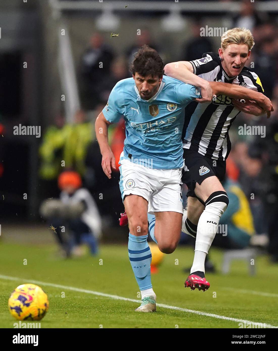 Manchester City's Ruben Dias and Newcastle United's Anthony Gordon ...