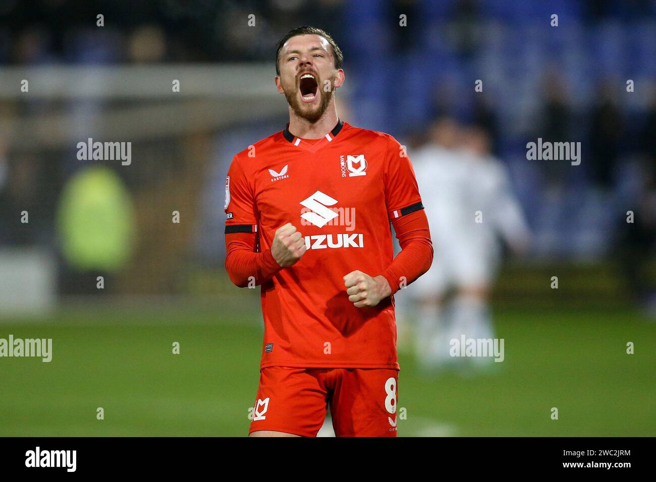 Birkenhead, UK. 13th Jan, 2024. Alex Gilbey of Milton Keynes Dons ...