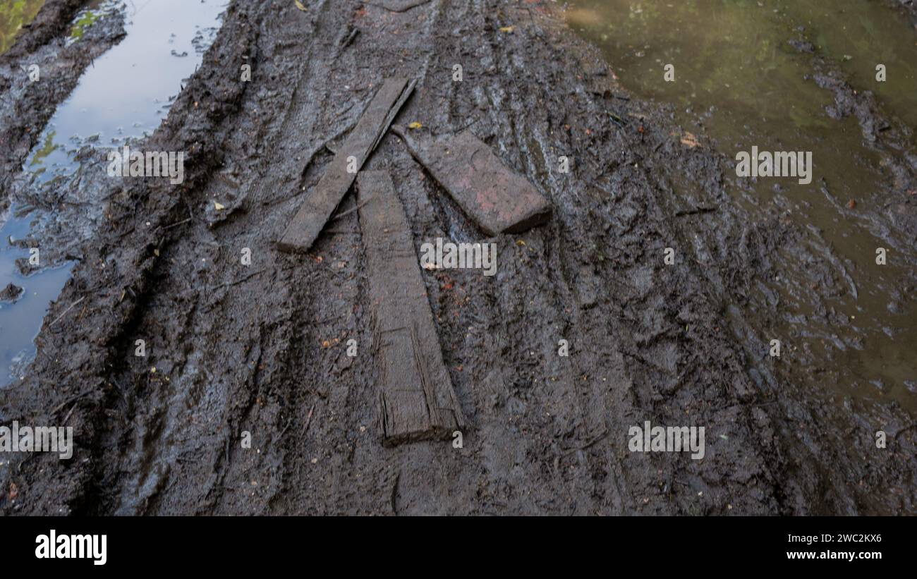 Poor road conditions. Impassable broken dirt roads outside the city ...