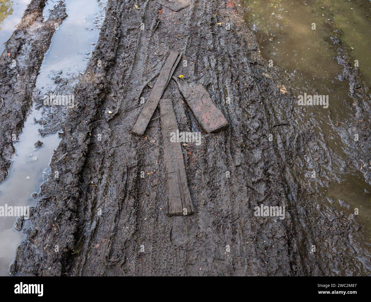 Poor road conditions. Off-road in an abandoned village in autumn. Dirt ...
