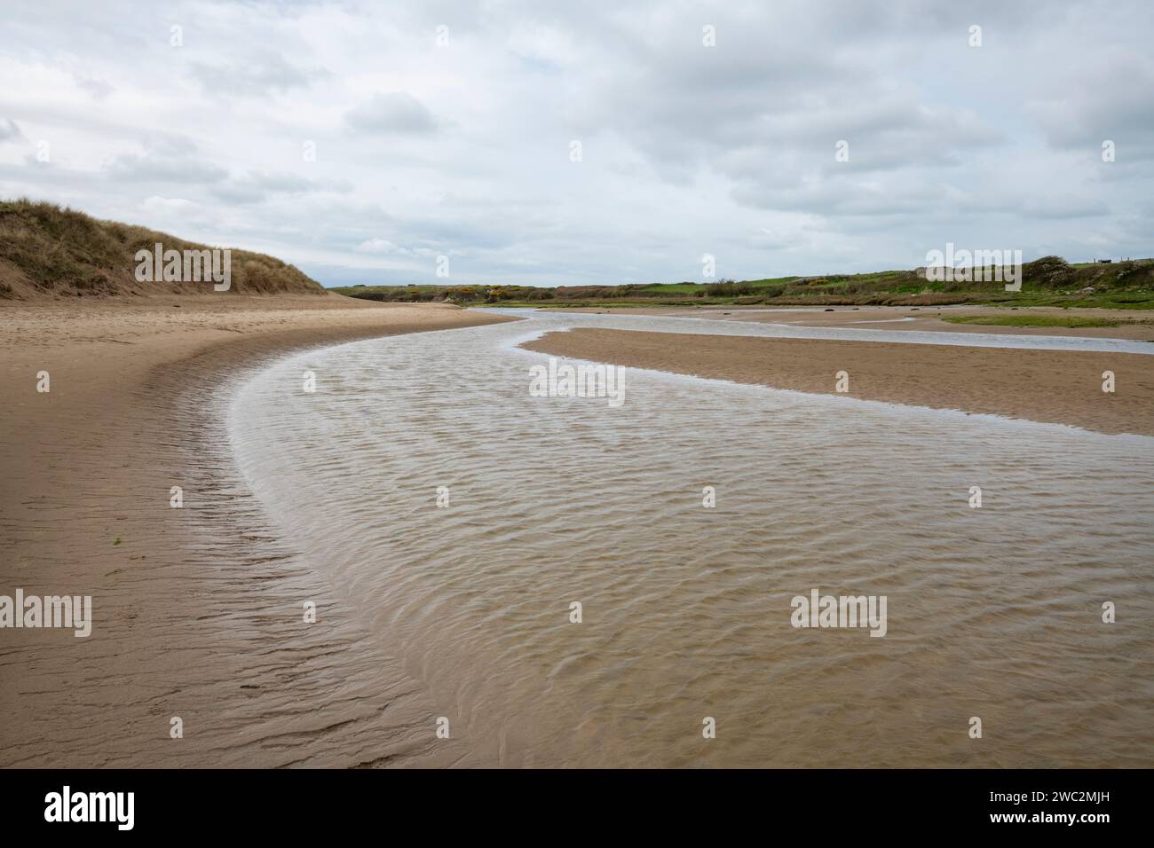 The Afon Ffraw before it meets the sea at Aberffraw on the west coast ...