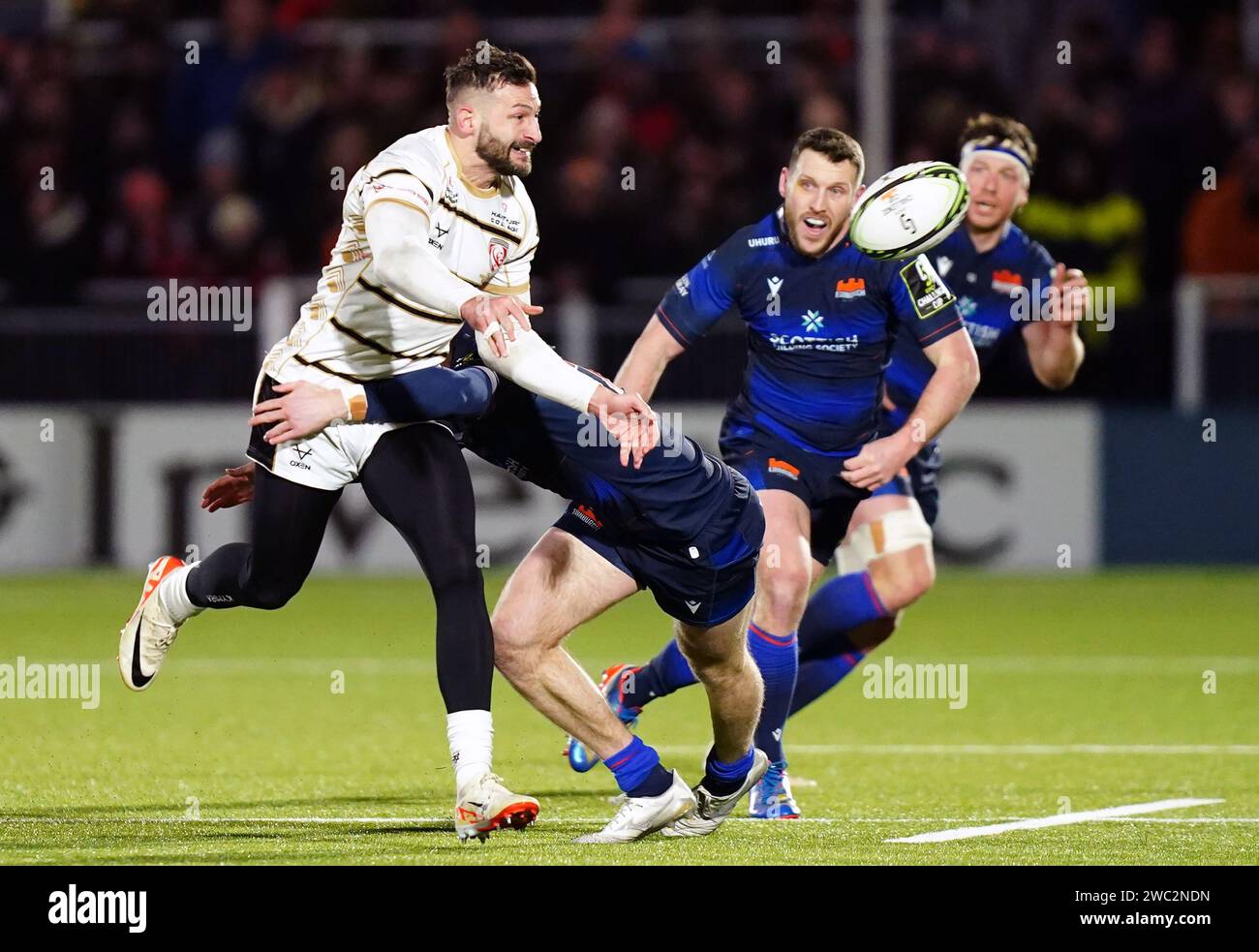 Gloucester's Jonny May offloads the ball during the EPCR Challenge Cup ...