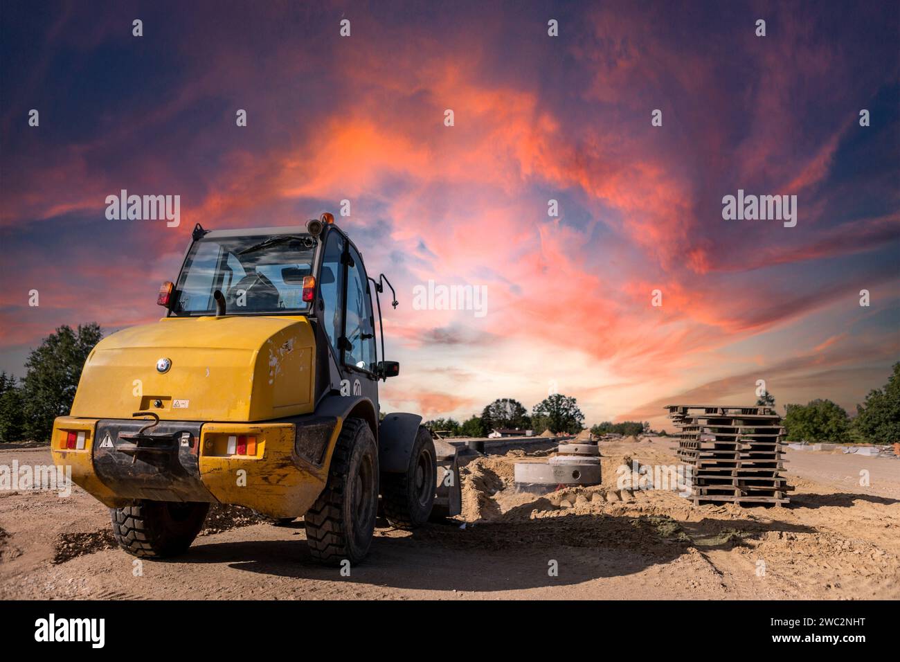 Highway construction. Pouring asphalt, installing sound barriers. Heavy ...