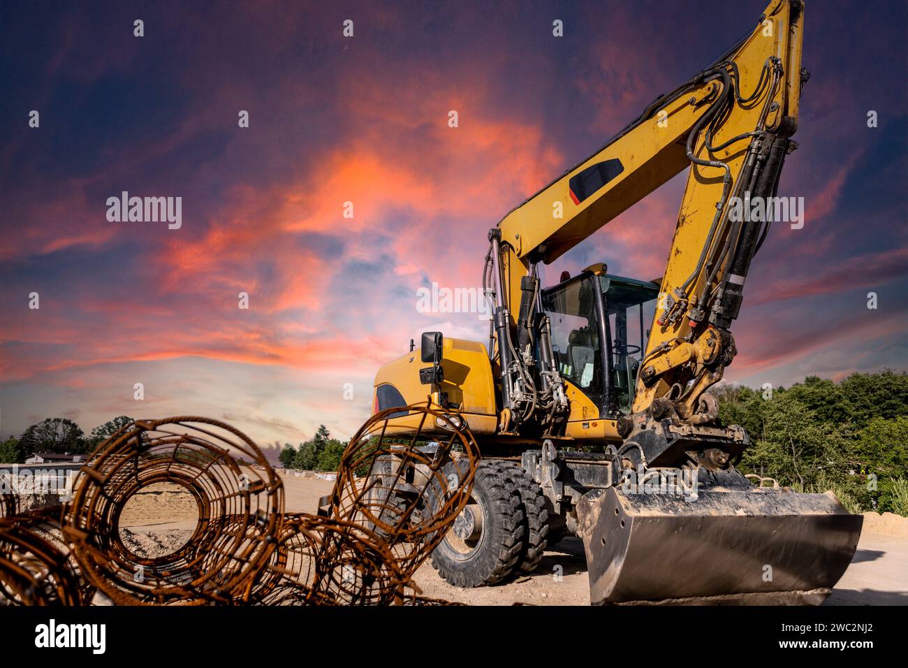 Highway construction. Pouring asphalt, installing sound barriers. Heavy ...