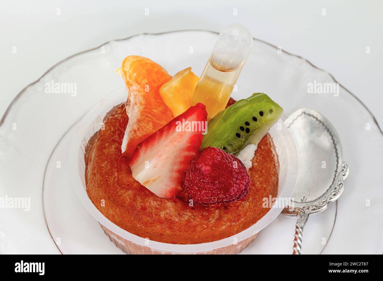 Rum baba on plate hi-res stock photography and images - Alamy