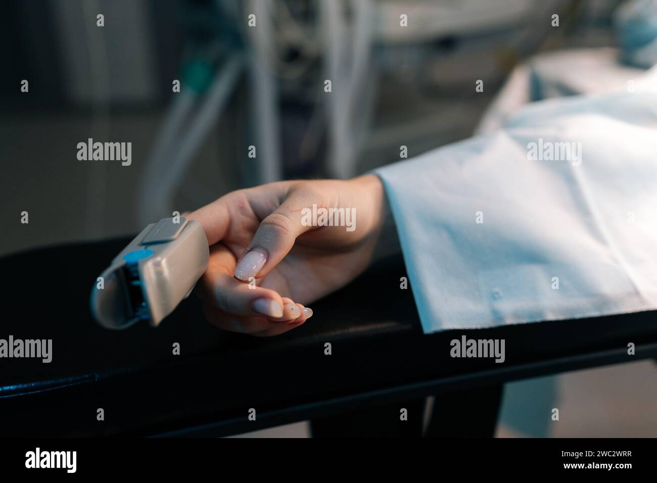 Closeup cropped shot of unrecognizable female hand with pulse oximeter ...