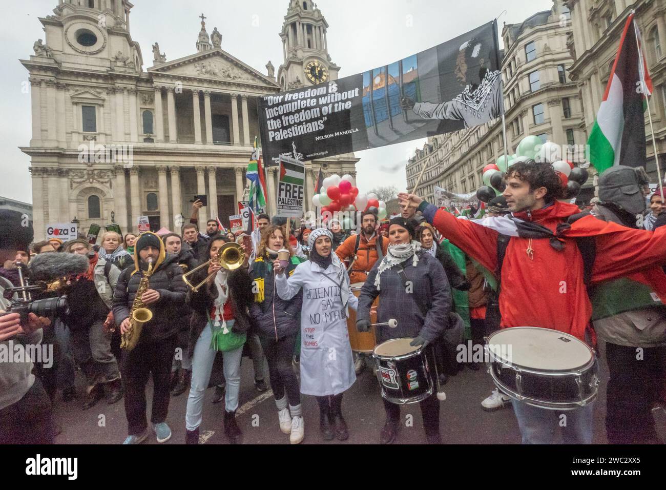 London, UK. 13 Jan 2024. A band and Mandela banner in front of St Pauls ...