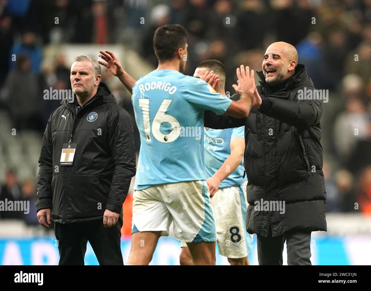 Manchester City's Rodri greets manager Pep Guardiola following the ...