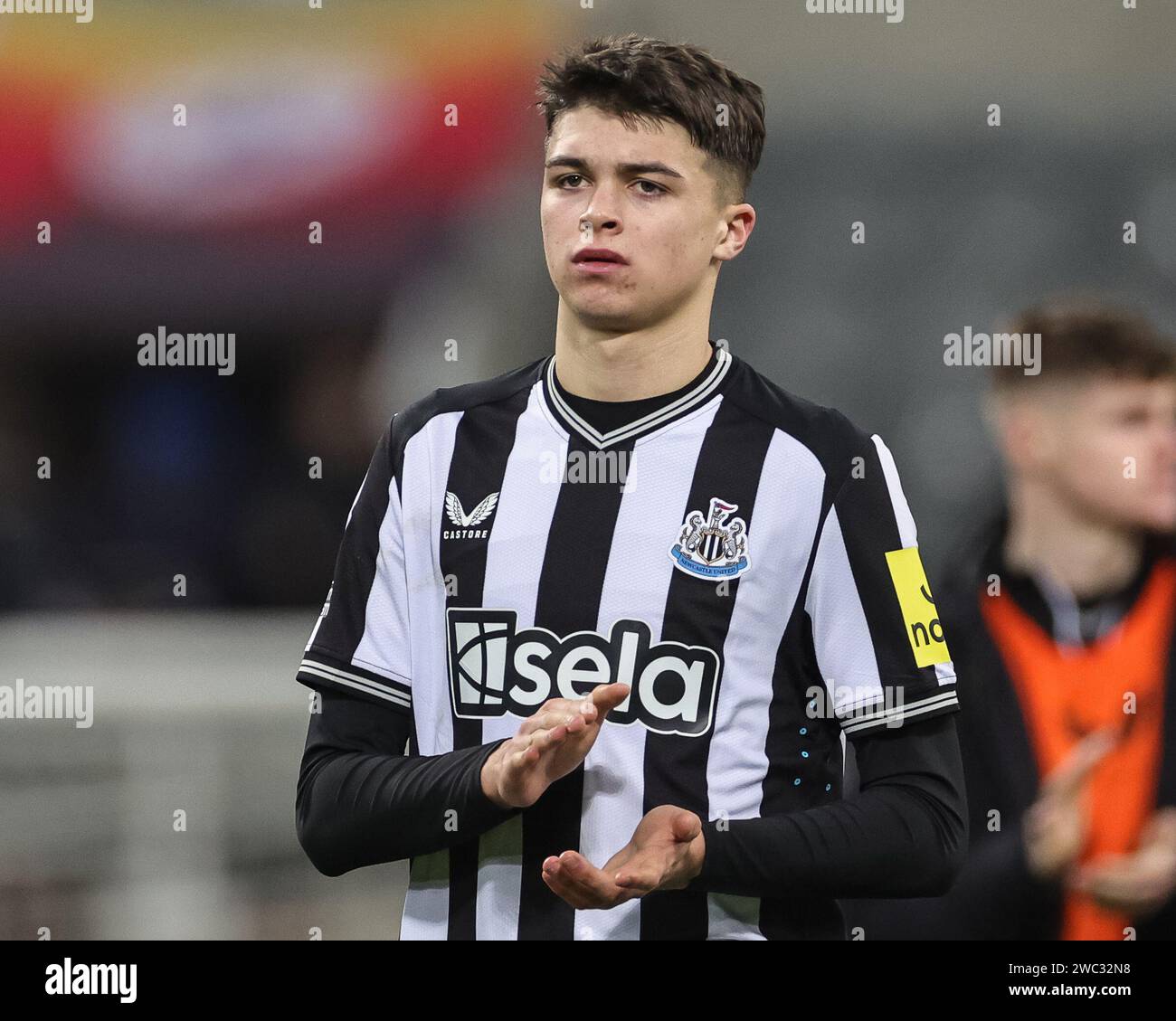 Newcastle, UK. 13th Jan, 2024. Lewis Miley of Newcastle United applauds ...