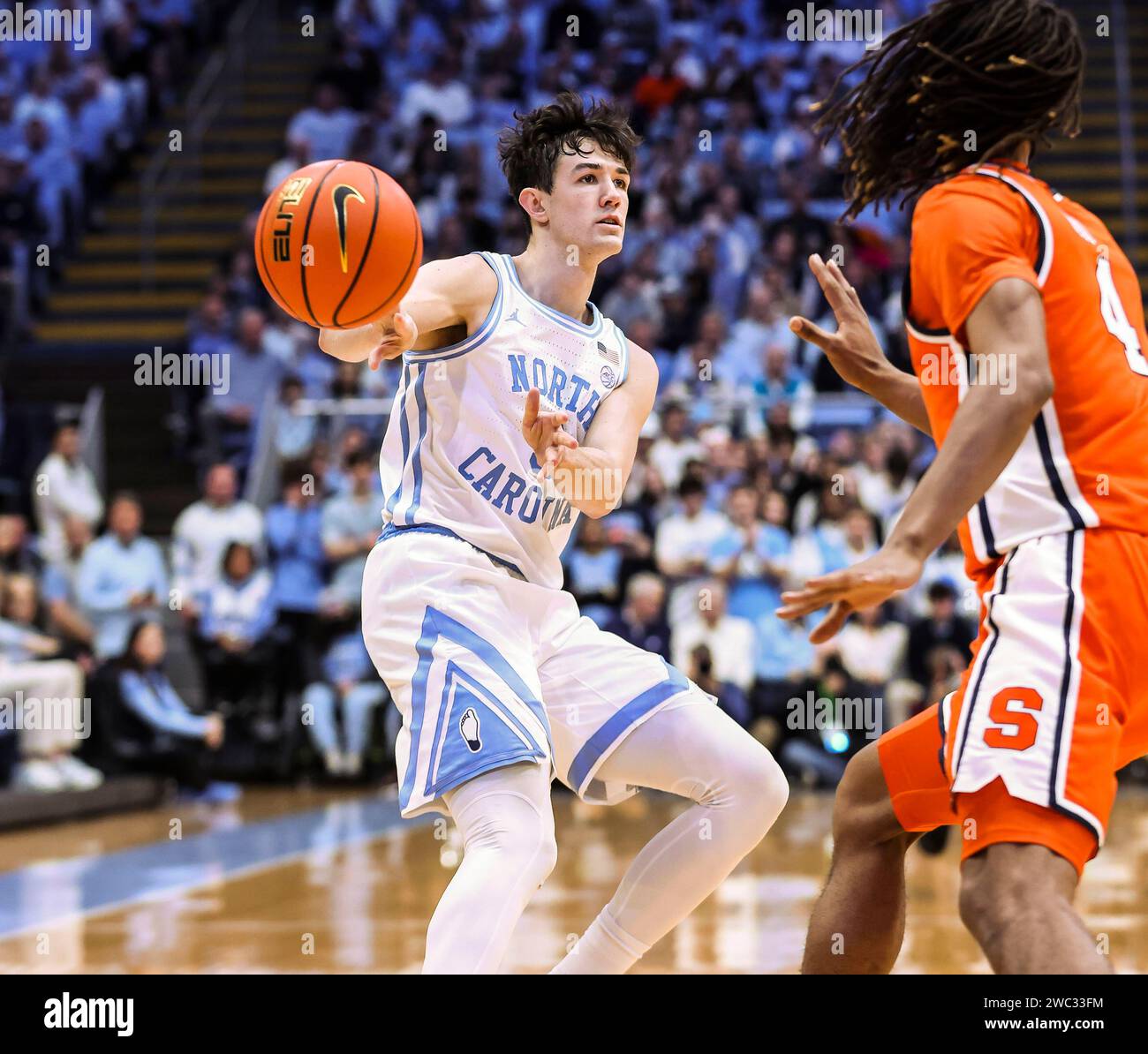 January 13, 2024: North Carolina senior Cormac Ryan (3) passes the ball ...