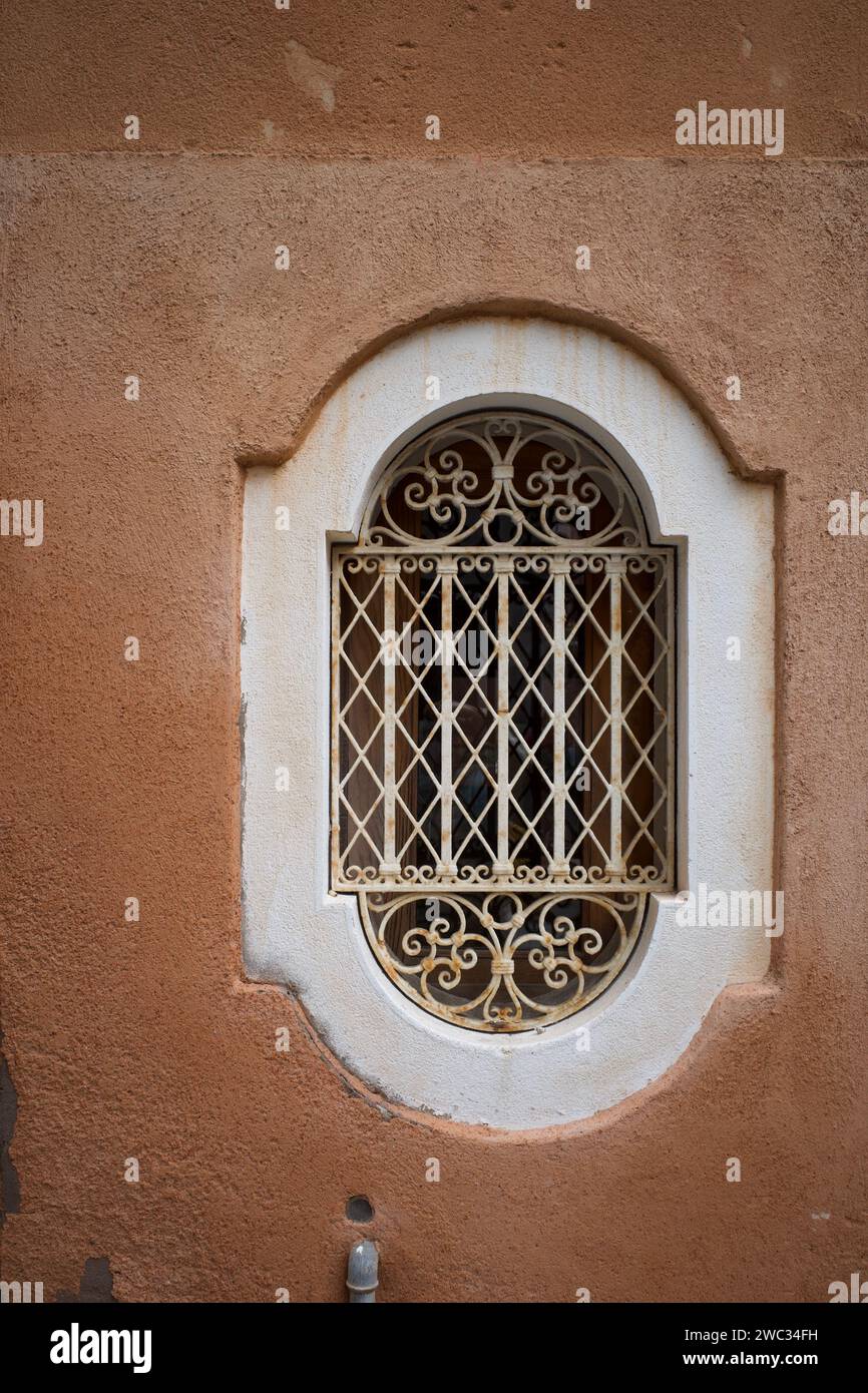 An old vintage style outdoor window in Venice Italy. The shape and ...