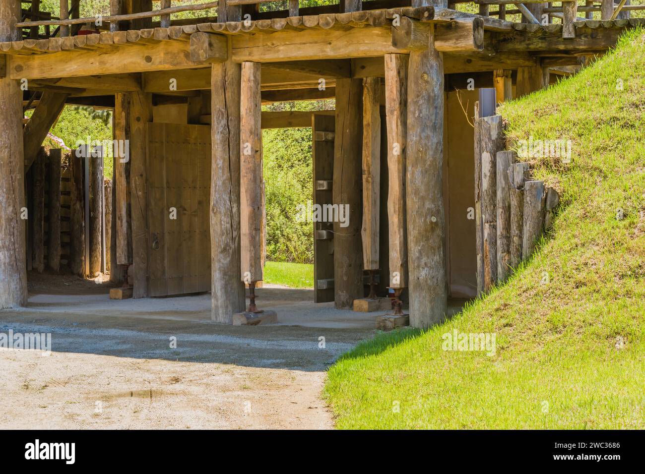 Wooden gate of traditional village made of logs and wooden planks with ...