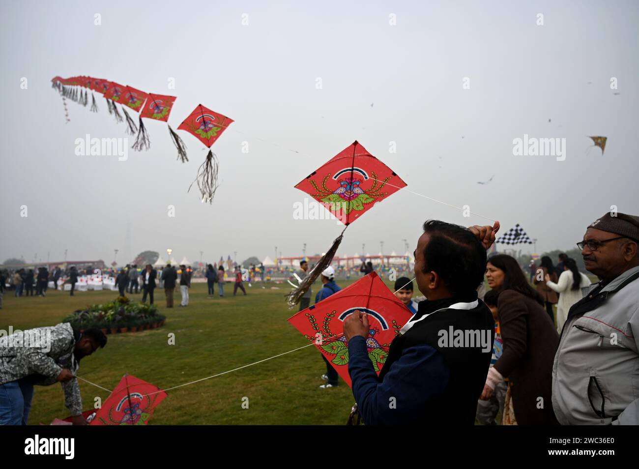 NEW DELHI, INDIA - JANUARY 13: People flying kites during the first ...