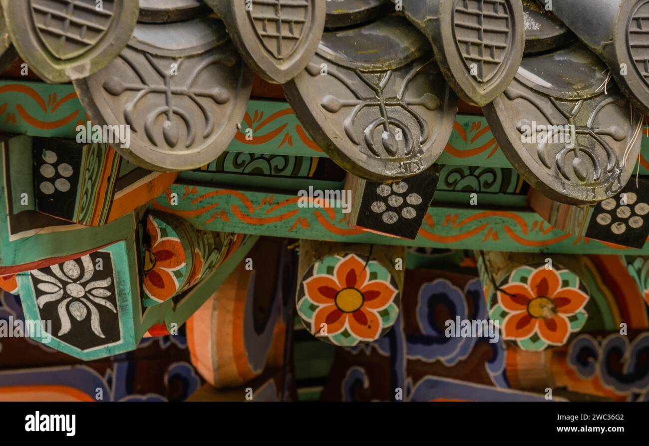 Closeup of corner of Asian building with ceramic tiled roof and ...