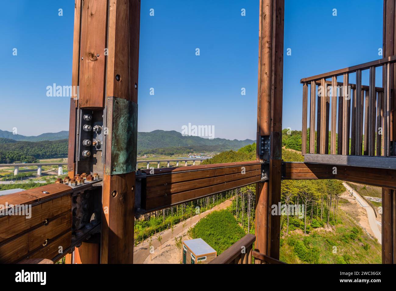 Wooden beams of tower on mountain top at public park with view of ...