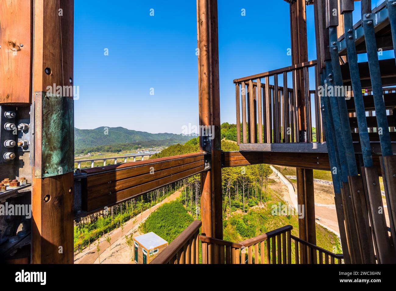Wooden beams of tower on mountain top at public park with view of ...