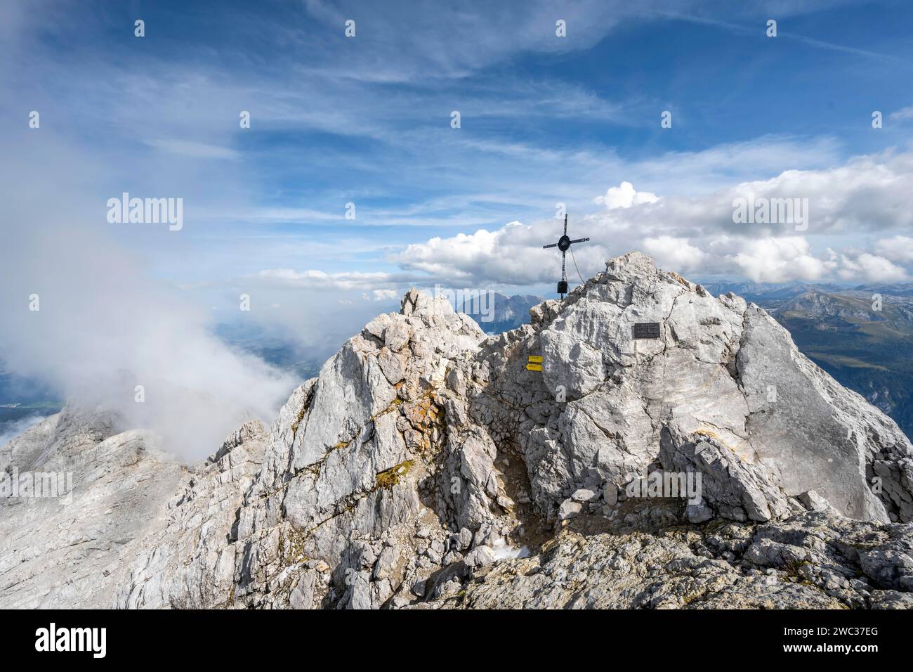 Rocky summit of the Watzmann Mittelspitze with summit cross ...
