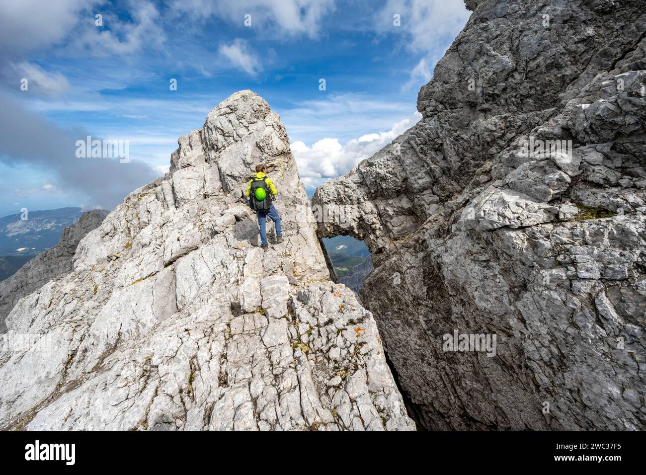 Mountaineer on a narrow rocky ridge, Watzmann crossing to Watzmann ...