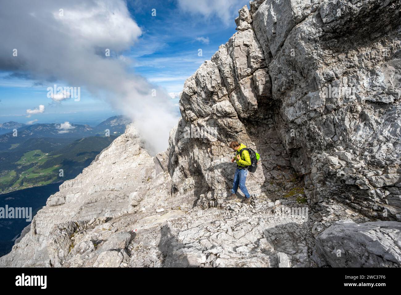 Mountaineer on a narrow rocky ridge, Watzmann crossing to Watzmann ...