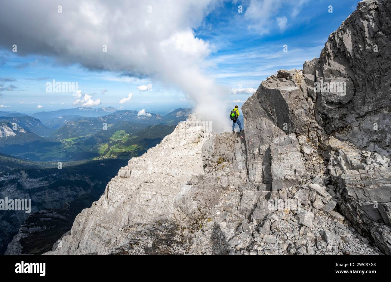 Mountaineer on a narrow rocky ridge, Watzmann crossing to Watzmann ...