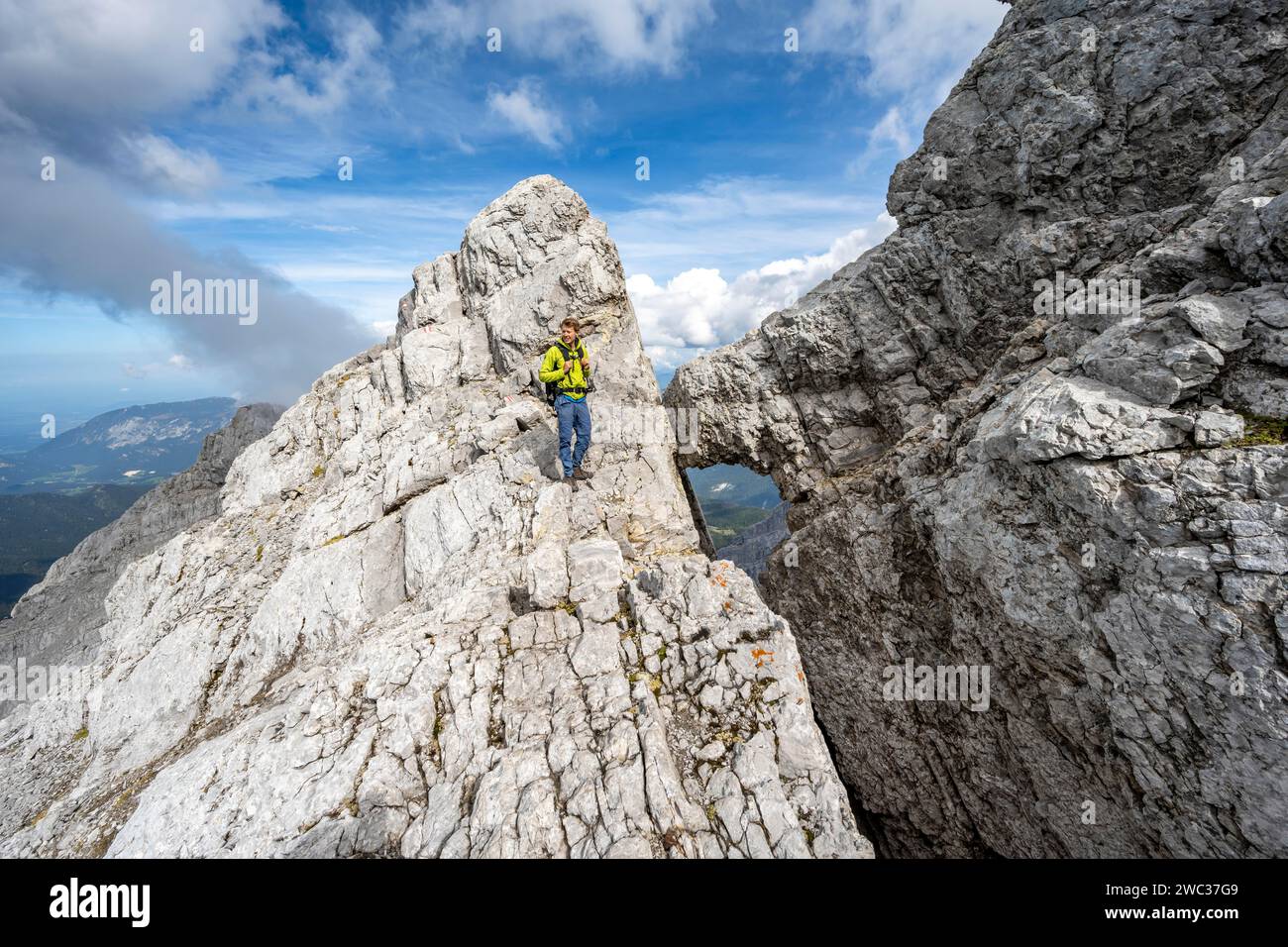 Mountaineer on a narrow rocky ridge, Watzmann crossing to Watzmann ...