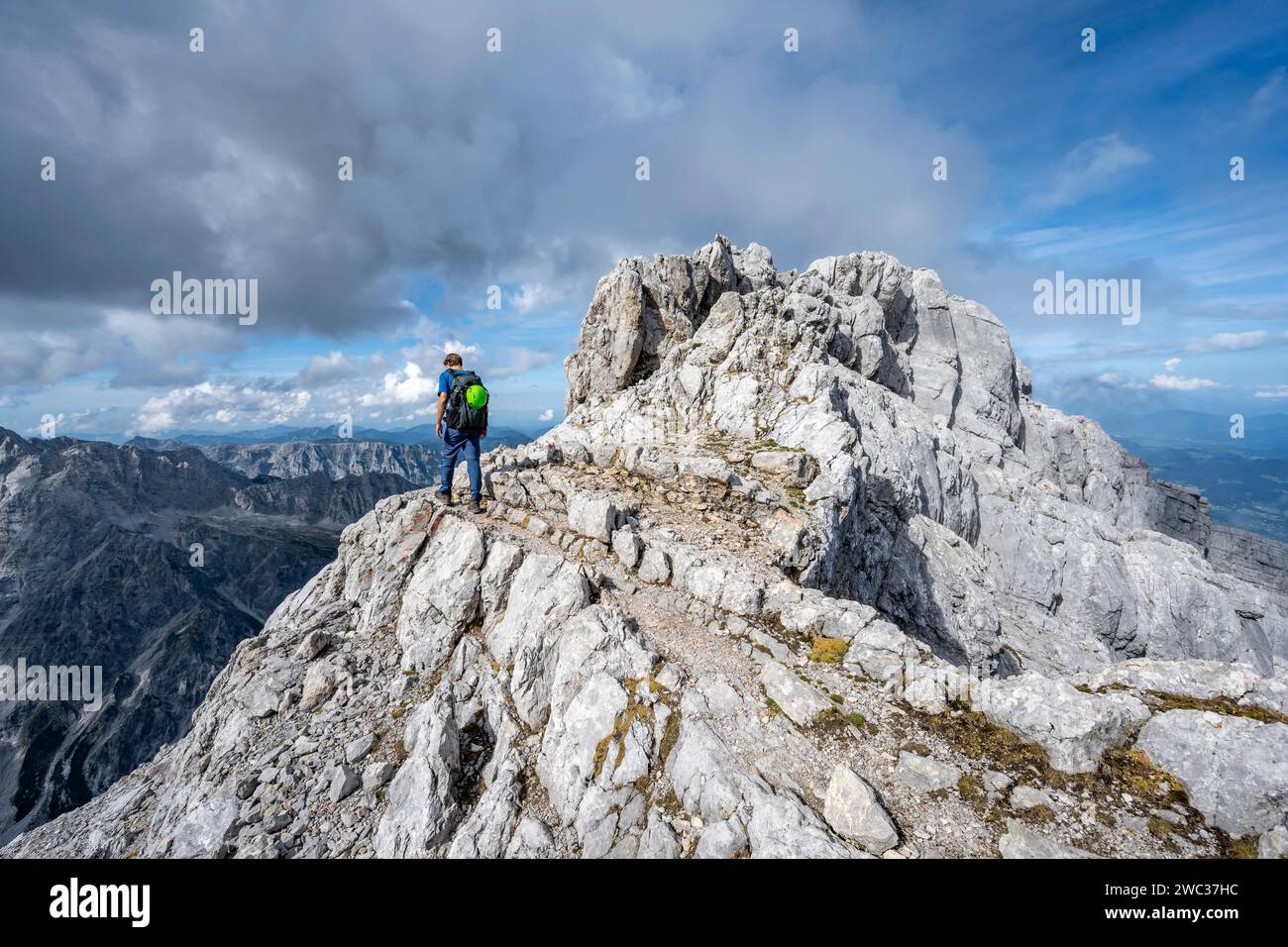 Mountaineer on a narrow rocky ridge, Watzmann crossing to the Watzmann ...