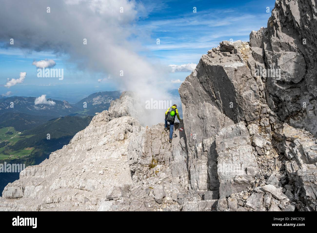 Mountaineer on a narrow rocky ridge, Watzmann crossing to Watzmann ...