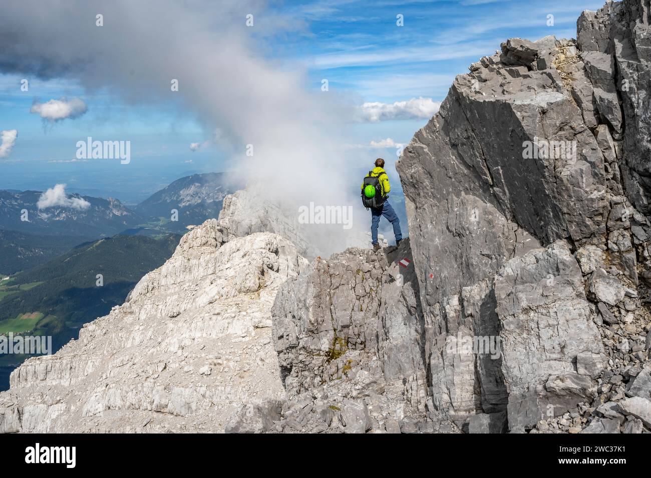 Mountaineer on a narrow rocky ridge, Watzmann crossing to Watzmann ...