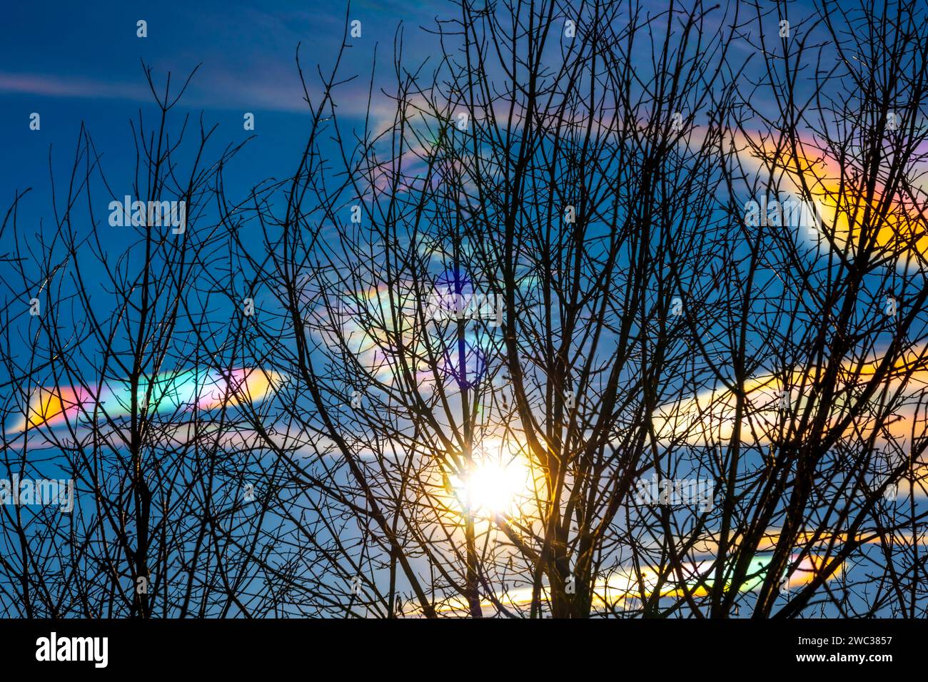 Beautiful Colorful Rainbow Clouds (Cloud Iridescence) Against Blue Sky ...
