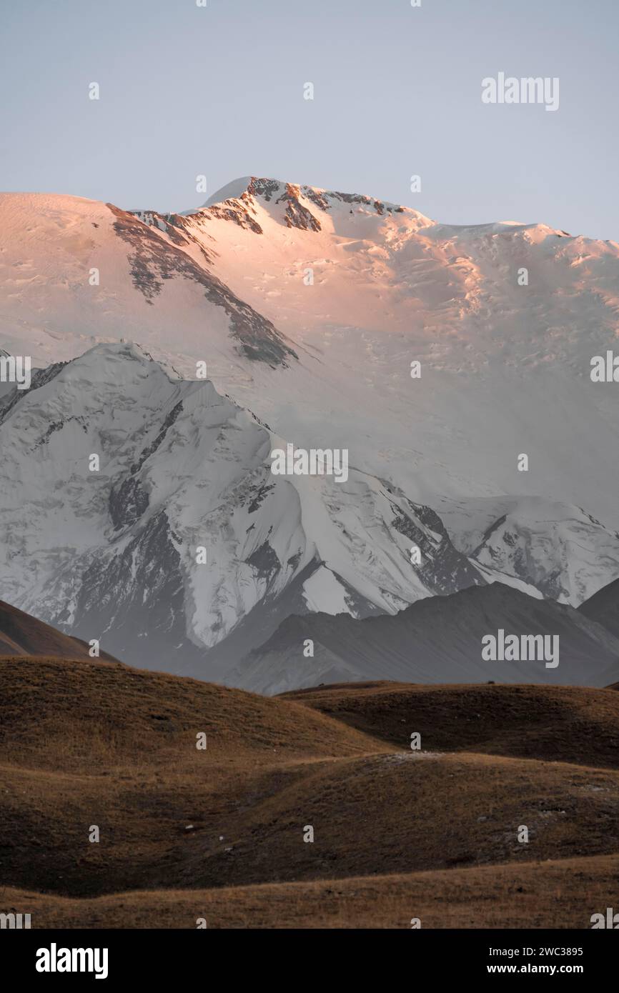 Mountain landscape at sunset, summit of Pik Lenin with glacier, Trans ...
